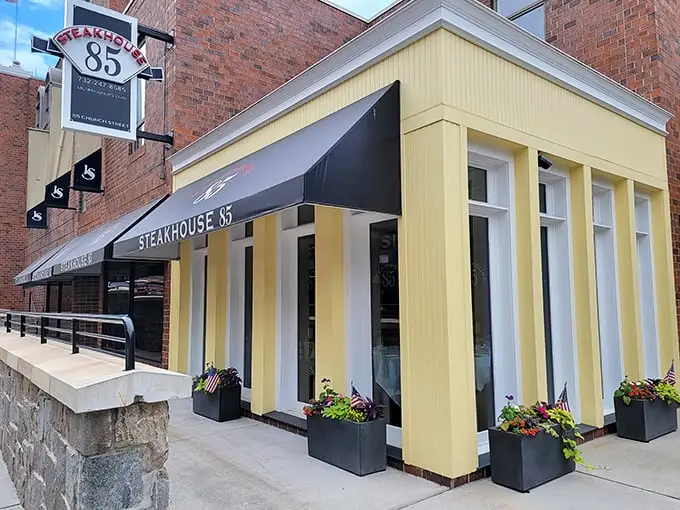 Steakhouse 85's bright yellow facade stands out like a golden ticket to Beef Wonkaland.