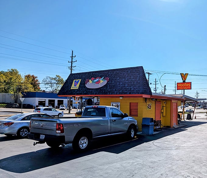 This sunshine-yellow hut proves the best Chicago dogs in Missouri come with a side of architectural charm and zero pretension.