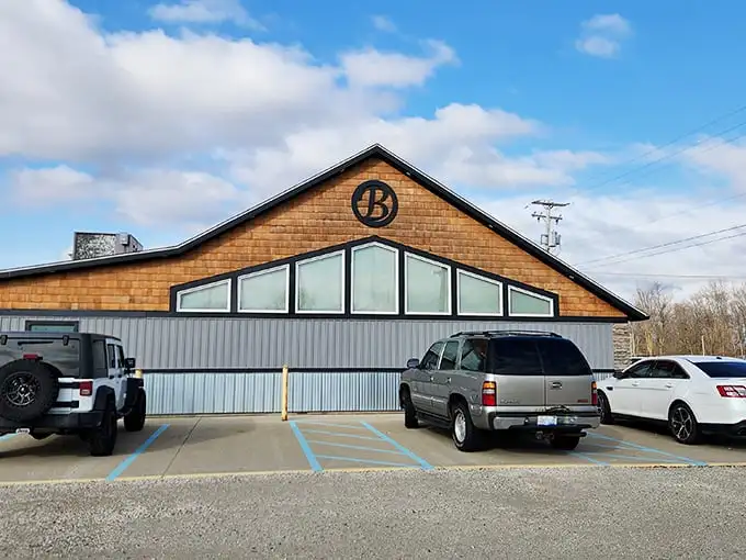 Cedar shingles and stone facade hide Bill's true superpower – transforming beef into the stuff of Michigan legend.