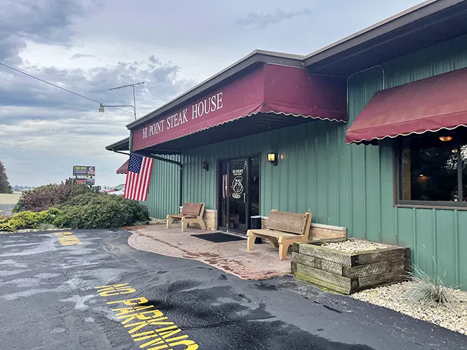 Those wooden benches outside aren't for show – they're for the happy folks waiting their turn at steak nirvana.