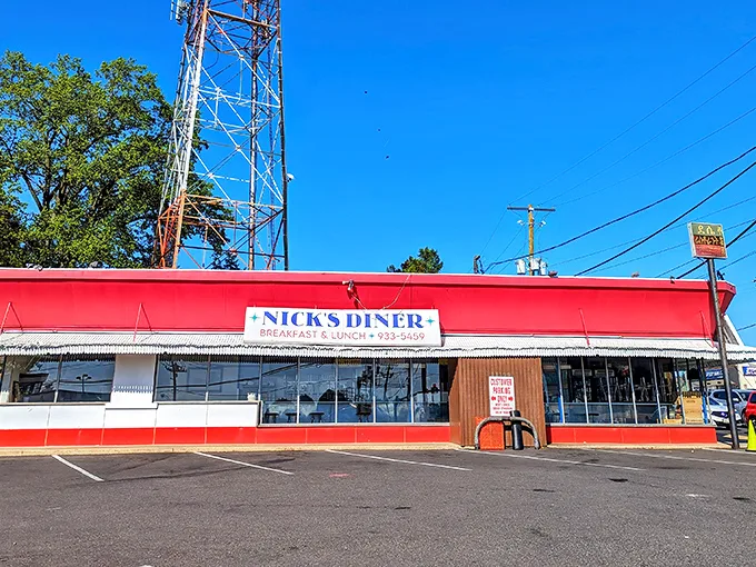 The classic roadside profile of Nick's Diner stands tall against the blue Maryland sky, promising breakfast salvation to weary travelers.