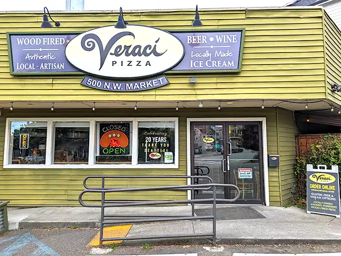 Twenty years serving authentic artisan pies. That sign isn't just advertising—it's a beacon of hope for the pizza-deprived.