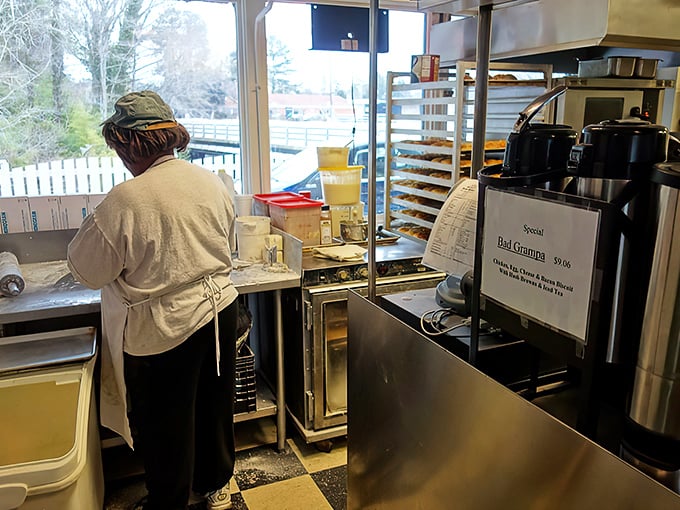 Where the magic happens: Dedicated hands crafting biscuit perfection in a kitchen that's been turning out Southern breakfast bliss since 1978.