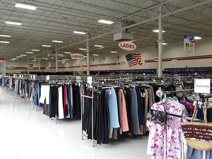 A wonderland of organization awaits inside – racks stretch toward some distant horizon, with clear signage guiding your treasure hunt.