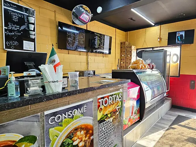 The yellow walls aren't winning design awards, but that security mirror isn't for shoplifters—it's for spotting hungry customers before they faint from anticipation.