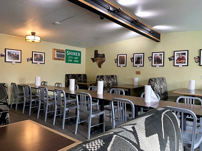 Texas pride adorns the walls while metal chairs await the faithful. That Shiner Beer sign isn't just decoration—it's a promise of authenticity in this Pacific Northwest outpost.