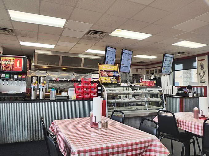 Red-checkered tablecloths and corrugated metal walls create the perfect backdrop for comfort food magic. No pretension, just delicious intentions.