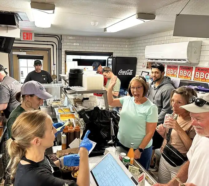 Inside, the organized chaos of hungry customers and busy staff creates that perfect BBQ joint energy—where anticipation is half the experience.