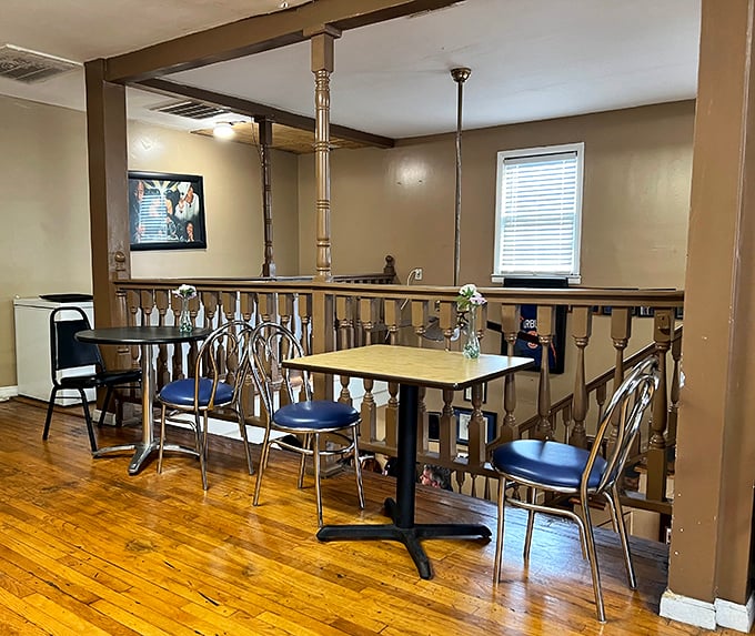Simple wooden railings and no-nonsense seating tell you exactly what matters here—the food, not fancy frills.