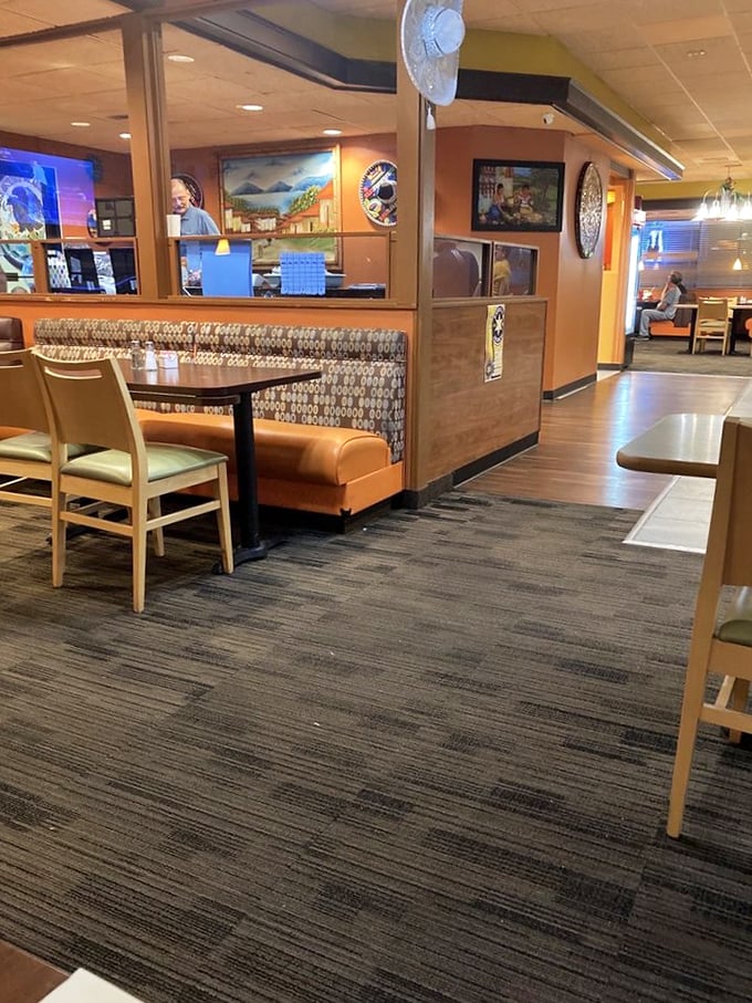 Cozy booths, warm orange walls, and the unmistakable buzz of happy diners. This isn't just a restaurant—it's Ankeny's living room with better food.