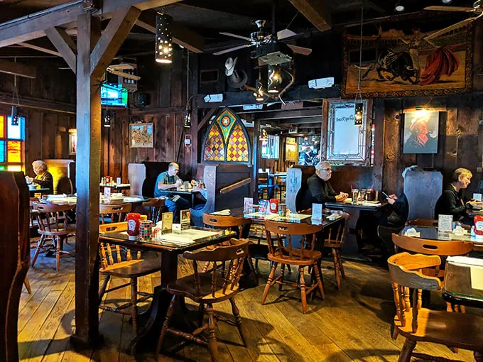 Inside, rustic charm meets western nostalgia with wooden beams overhead, stained glass accents, and tables that have hosted countless Arizona tales.