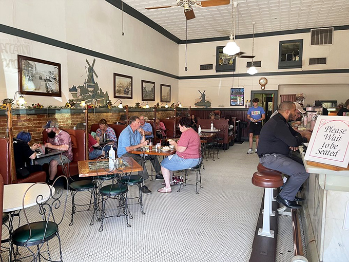 Step inside and suddenly you're transported to a simpler time—leather booths, ceiling fans, and conversations that flow as easily as the coffee refills.