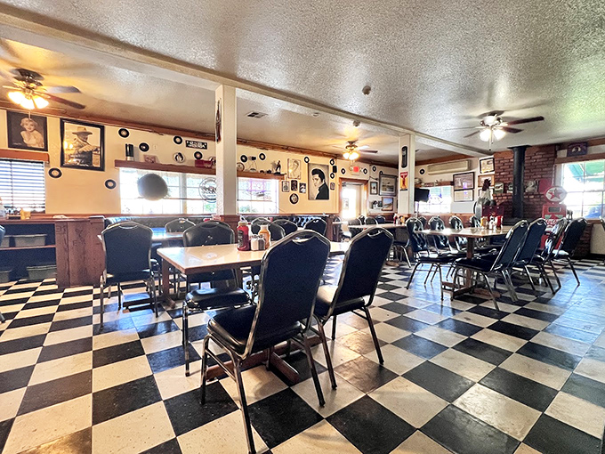 Step onto this checkered floor and you've officially left 2023. The walls tell stories of poodle skirts and pompadours while ceiling fans lazily spin overhead.