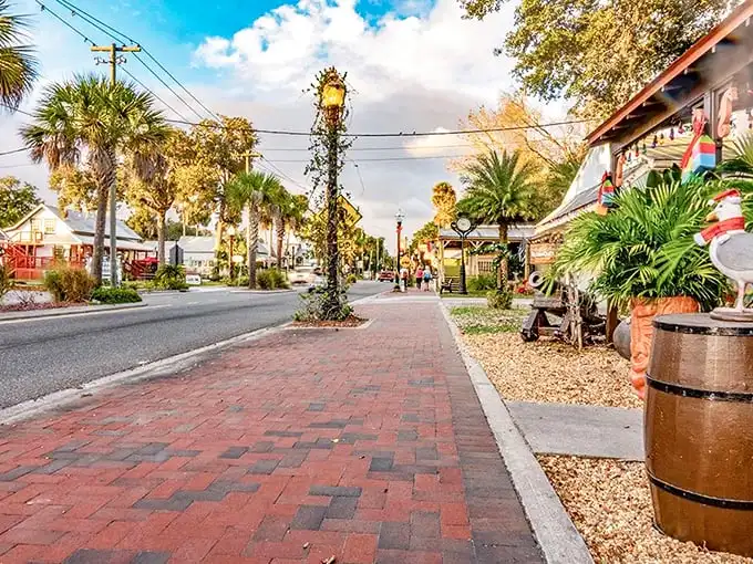 Palm trees sway along Crystal River's brick-paved sidewalks, where vintage lampposts and coastal charm create the perfect Florida postcard moment.