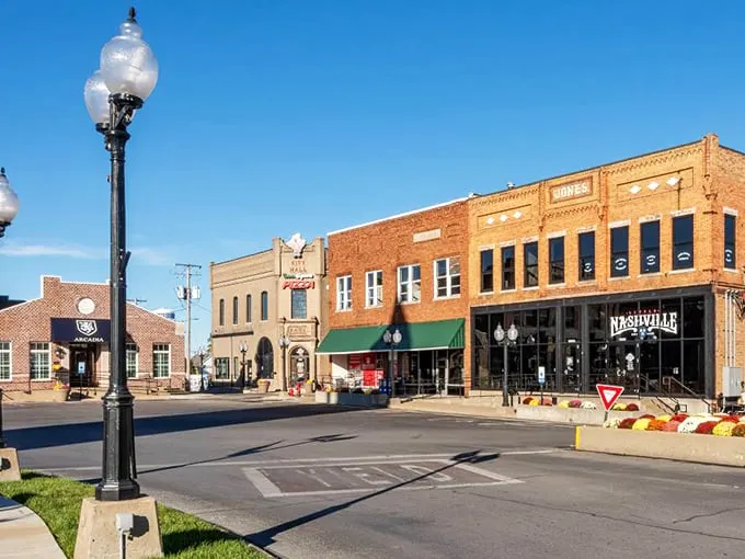 Main Street's vintage charm isn't manufactured—it's the real deal, where local businesses have thrived for generations beneath those classic green awnings.