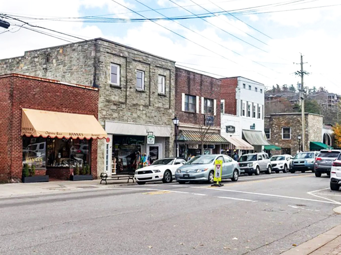 Historic buildings line downtown Blowing Rock, where local boutiques have stubbornly resisted the chain store invasion. Shopping here feels like time travel with credit cards.