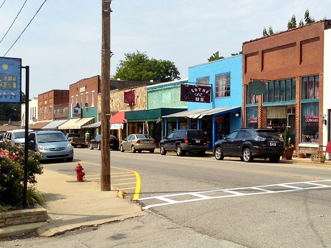 The colorful storefronts of downtown Hardy aren't just pretty facades—they're living museums where modern shoppers hunt for yesterday's treasures.