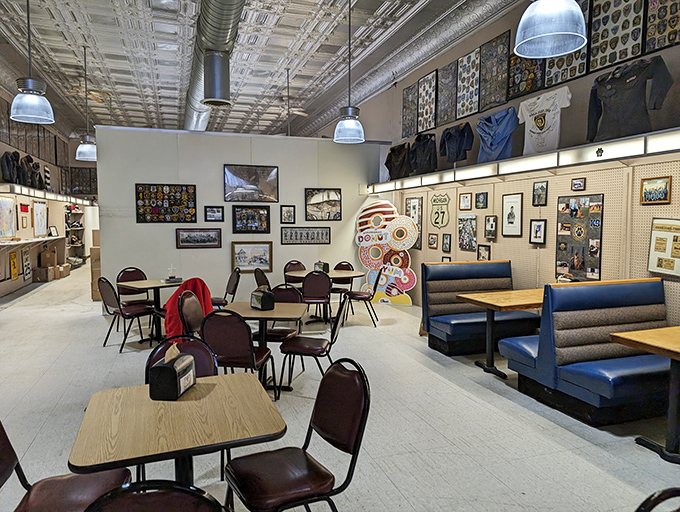 Tin ceilings, police patches, and comfortable seating—it's like someone designed a diner specifically for nostalgic comfort.
