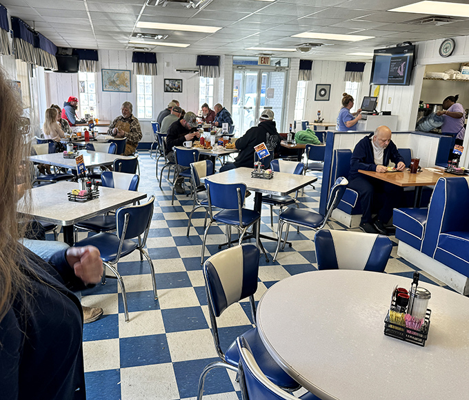 Where breakfast dreams come true. The classic blue and white checkerboard floor has witnessed more coffee refills and morning conversations than a talk show host.