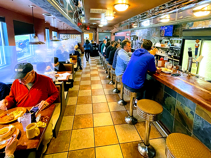 Inside, the classic diner layout creates the perfect symphony of sizzle and conversation – where breakfast dreams come to life.