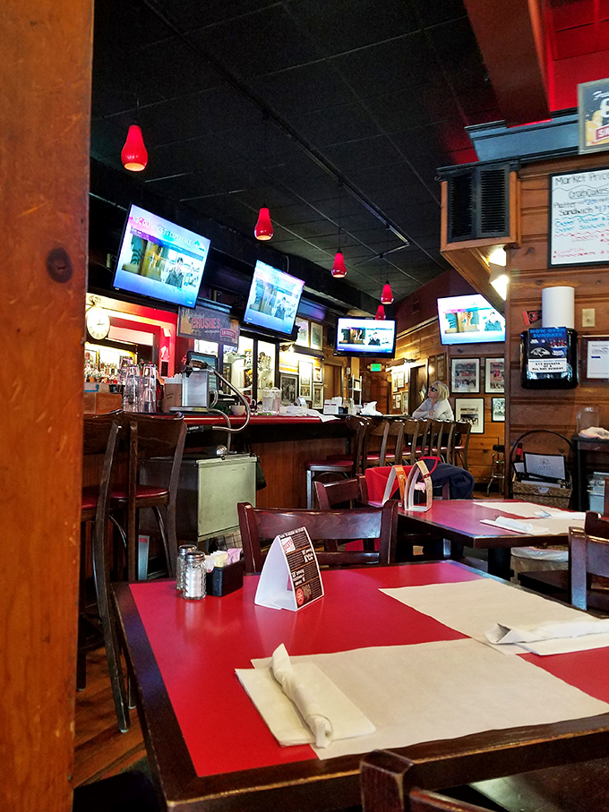 Inside, red tablecloths and wood paneling create that perfect "been here forever" vibe. It's like dining in your favorite uncle's rec room—if he could really cook.