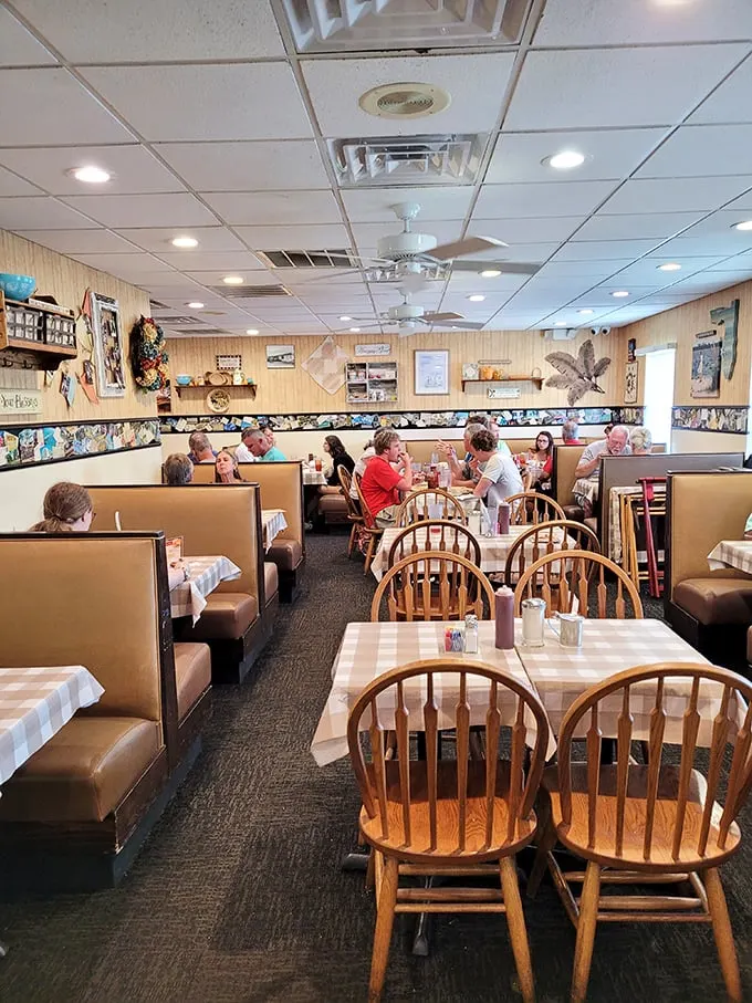 Inside, wooden chairs and checkered tablecloths create that perfect "grandma's dining room" vibe where calories don't count and diet plans go to die happy deaths.
