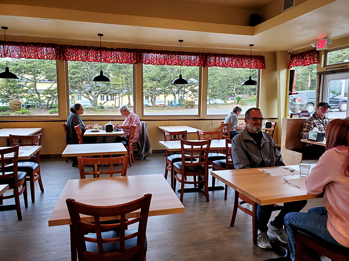 Simple wooden tables, large windows, and those quintessential red checkered valances – dining at Otis Café feels like coming home, if home had better cooks than most of us.