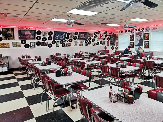 Step inside to a retro wonderland where vinyl records meet red vinyl booths. This isn't decoration—it's a time machine that happens to serve pancakes.