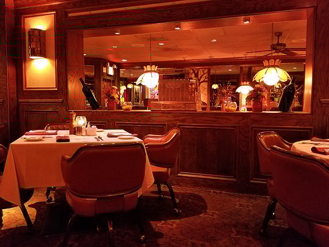 Stepping into this amber-lit dining sanctuary feels like discovering a secret society where the password is "medium rare."