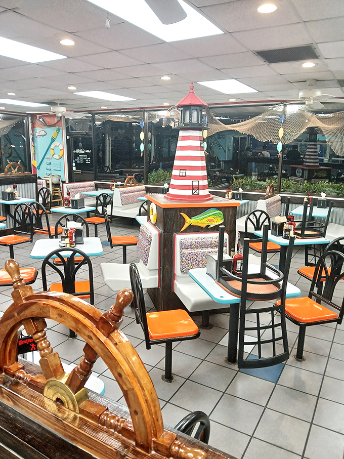 Step inside and you're greeted by a nautical wonderland complete with lighthouse centerpiece—Wes Anderson would approve of this meticulously themed maritime universe.