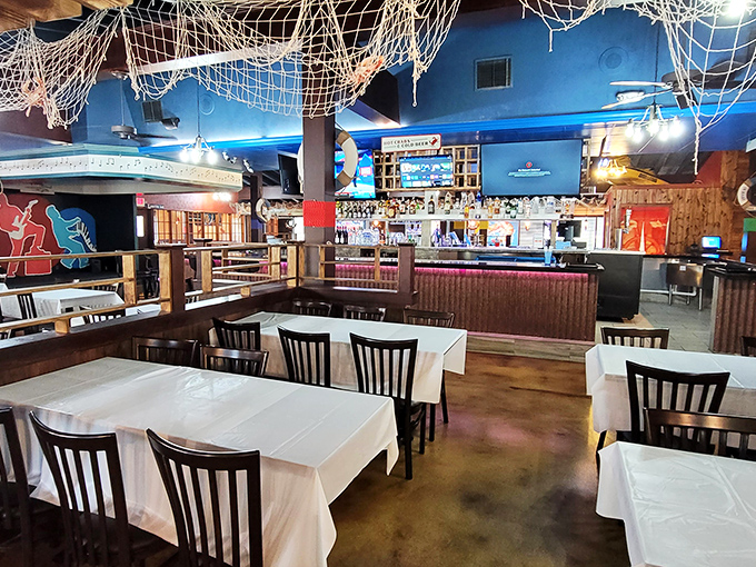 Fishing nets cascade from bright blue ceilings, creating the perfect illusion that you've stumbled into a dockside eatery rather than the Kansas suburbs.