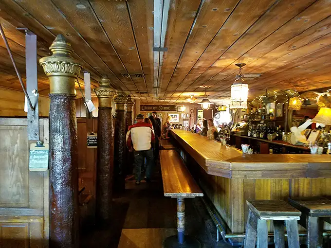 The bar at The Old Place isn't just serving drinks—it's serving history, with wooden pillars that have witnessed countless celebrations and first dates.