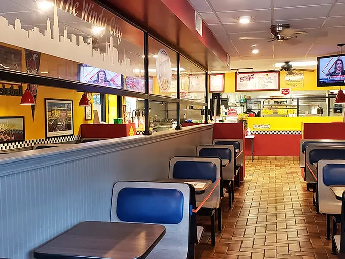 Yellow walls, classic booths, and that distinctive Chicago skyline silhouette—walking in feels like teleporting straight to the Windy City.