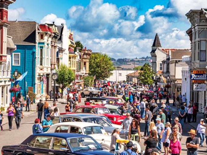 Main Street during festival time—where vintage automobiles meet Victorian architecture in a celebration that transforms Ferndale into California's most photogenic block party.