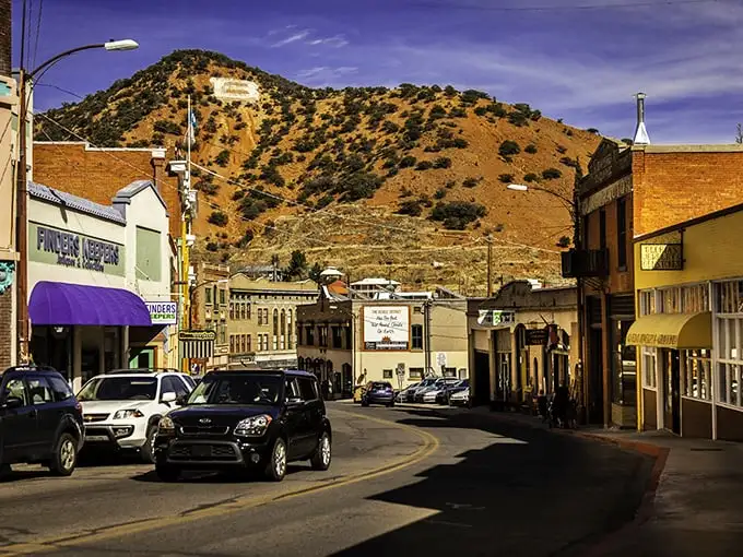 Bisbee: Nestled between mountains like a colorful movie set where copper mining history meets bohemian charm in the most unexpected Arizona address.