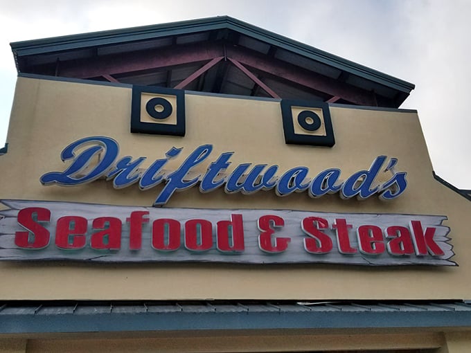 Driftwoods' sign tells you exactly what you're in for – seafood AND steak perfection. No need to choose between surf and turf here.