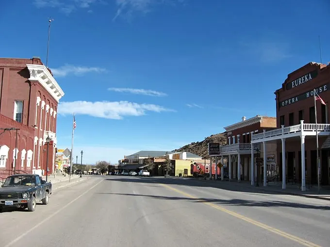Eureka: "The Eureka Opera House and courthouse stand like dignified sentinels on Main Street, their brick facades having witnessed over a century of Nevada's boom-and-bust drama."