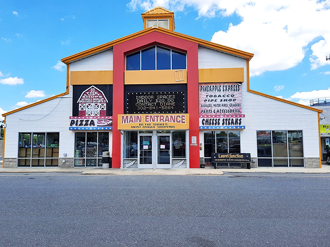 Laurel Junction's façade is like a mall designed by committee—pizza, bikes, and treasures all under one gloriously mismatched roof.
