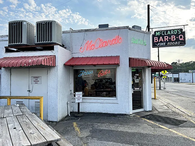 McClard's BBQ: Where neon signs promise "Fries" and "Pies," but it's the smoky treasures between them that'll change your life.