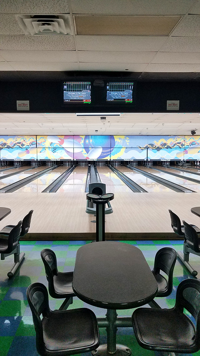 The perfect setup awaits – gleaming lanes, digital scoring, and that unmistakable bowling alley ambiance that instantly transports you back to simpler times.