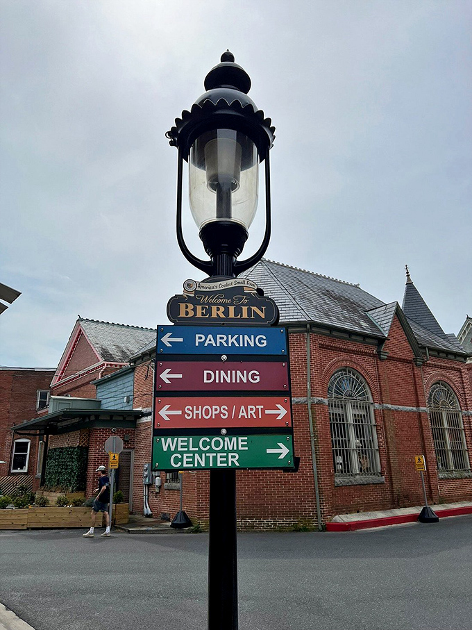 This vintage lamppost doesn't just illuminate the street—it illuminates your options. Berlin's directional signs are as charming as they are helpful, guiding visitors with old-world elegance.