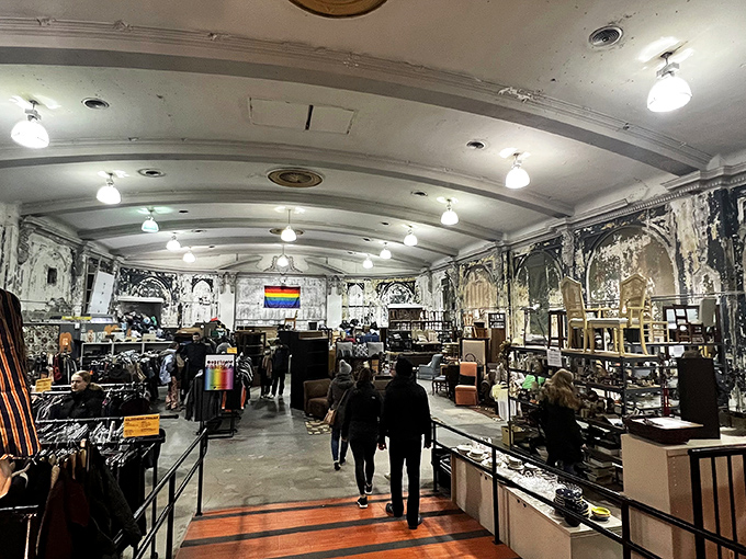 Step into a cathedral of commerce where vaulted ceilings and weathered walls create the perfect backdrop for treasure hunting.