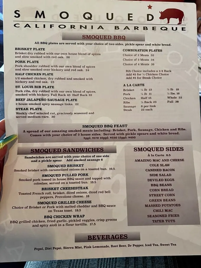 A menu that reads like poetry to the protein-obsessed. The "Smoqued BBQ Feast" isn't just a meal – it's an expedition.