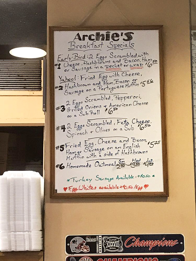 The breakfast specials board—handwritten with care—reveals morning treasures like the "Yahoo!" sandwich that gives boring breakfasts the boot.