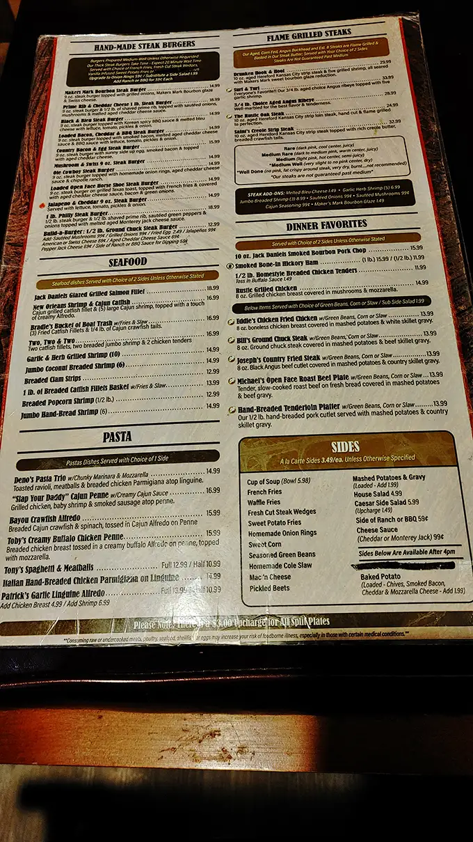 The menu reads like a love letter to protein—hand-made steak burgers, flame-grilled steaks, and enough comfort food to make your cardiologist wince approvingly.