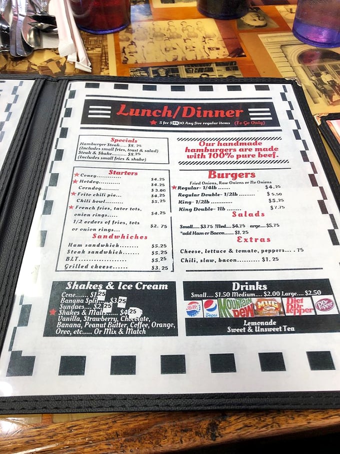 No fancy font or pretentious descriptions needed. This straightforward menu tells you exactly what you're getting—handmade burgers and classic comfort.