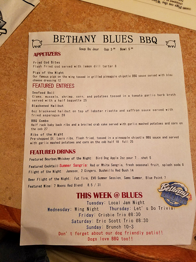 This menu isn't just a list of food—it's a roadmap to happiness with temptations like "Pigs of the Night" and a dog-friendly patio announcement that seals the deal.