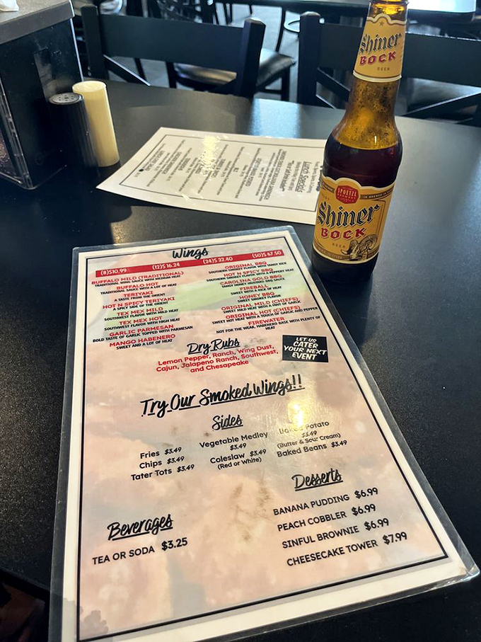 A menu that speaks the universal language of comfort food, with wings and dry rubs competing for your attention like siblings vying for the front seat.