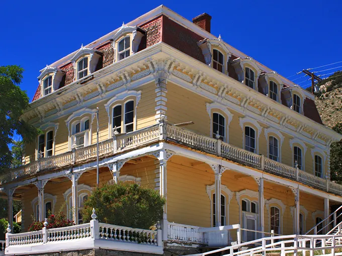 This magnificent yellow mansion isn't just eye candy—it's living history with a side of Victorian splendor and mountain views.