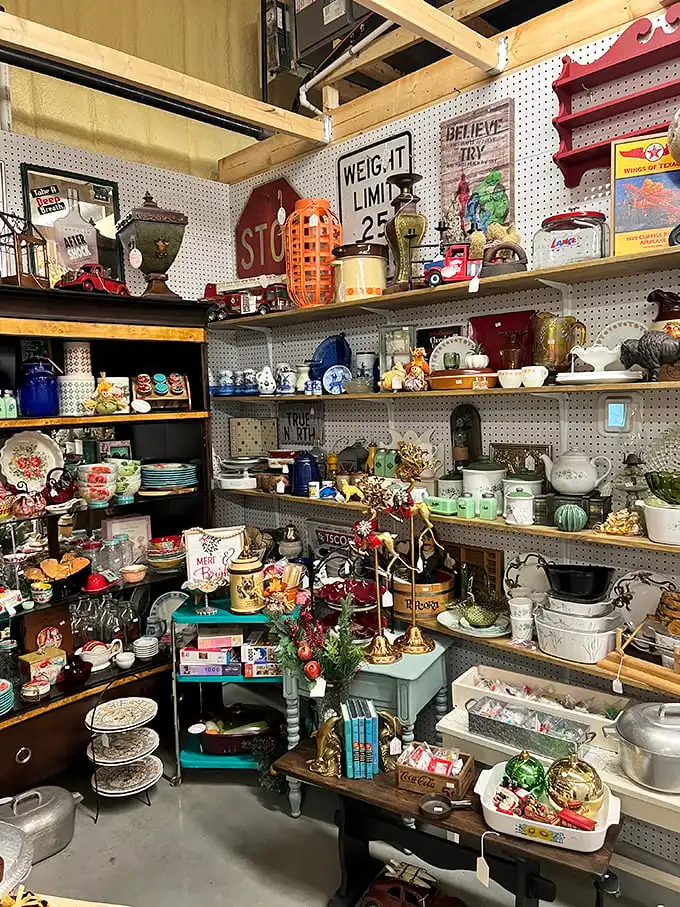 One collector's clutter is another's paradise. This booth overflows with vintage glassware, kitchenware, and decorative items that whisper stories of dinner parties past.